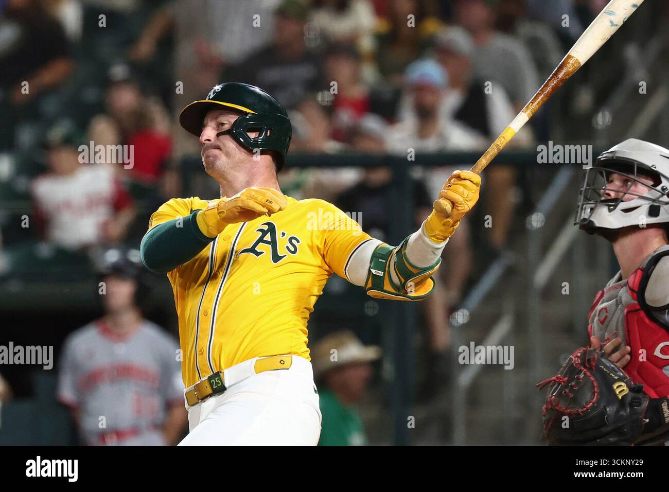 Athletics' Brent Rooker reacts to hitting a flyout to center field ...