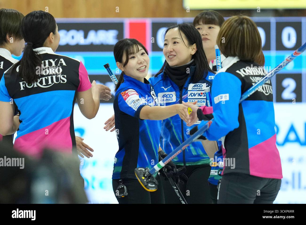 Yurika Yoshida (center left) and Satsuki Fujisawa (center right) react after losing against ...