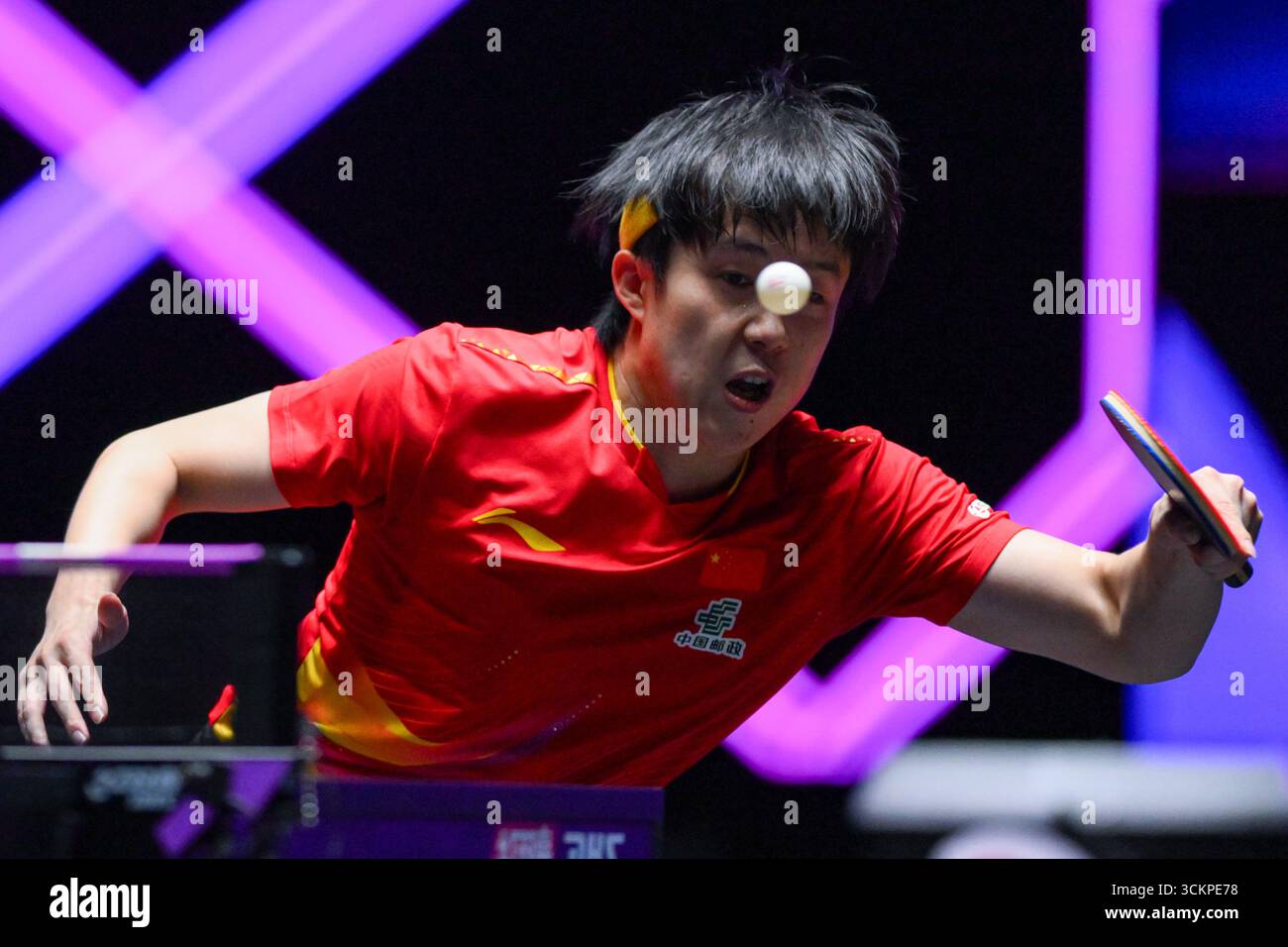 (250913) -- MACAO, Sept. 13, 2025 (Xinhua) -- Wang Chuqin of China hits ...