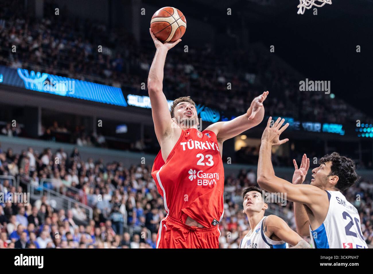 Alperen Sengun of Turkiye (L) and Alexandros Samodurov (R) of Greece ...