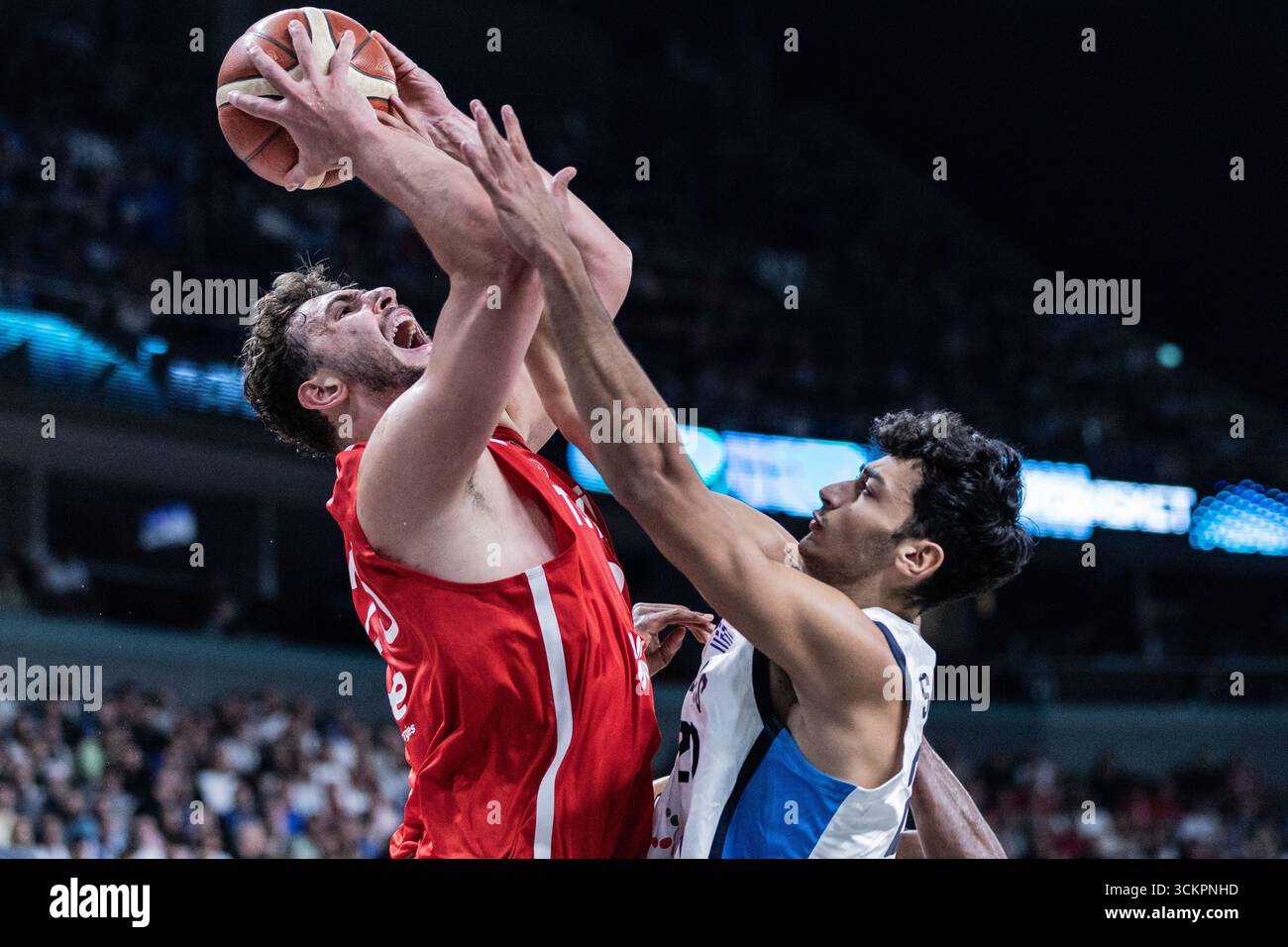 Alperen Sengun of Turkiye (L) and Alexandros Samodurov (R) of Greece ...