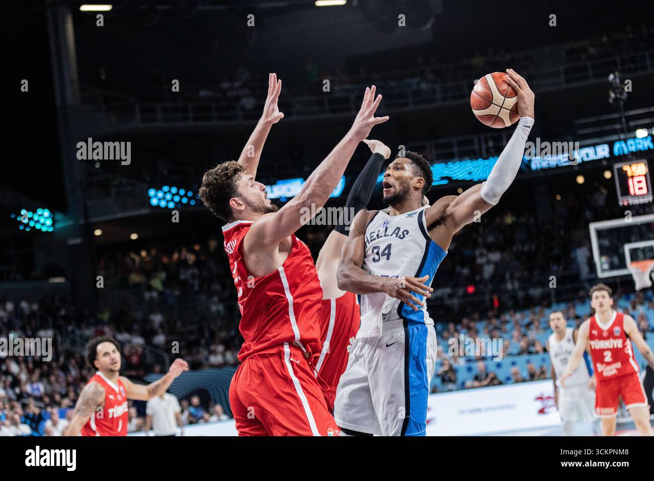 Giannis Antetokounmpo of Greece (R) and Alperen Sengun (L) of Turkiye seen in action during the ...