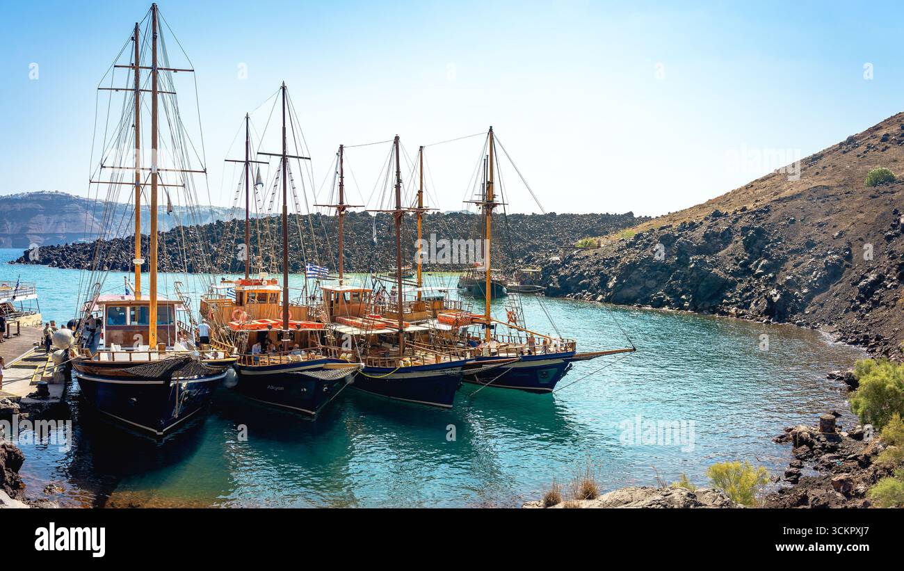 Santorini, Greece - Tourist ships docked at the Nea Kammeni Volcanic ...