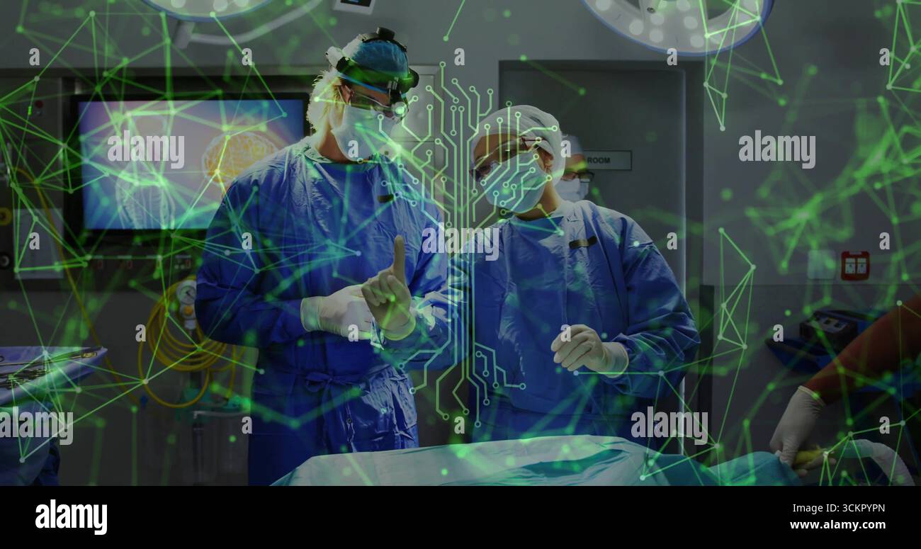 Two surgeons wearing blue scrubs performing brain surgery in operating ...