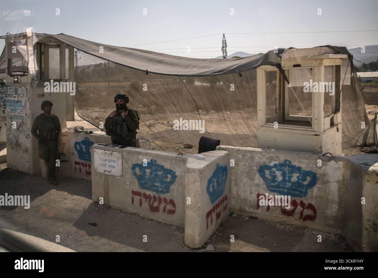 An Israeli military checkpoint seen in the occupied city. More than ...