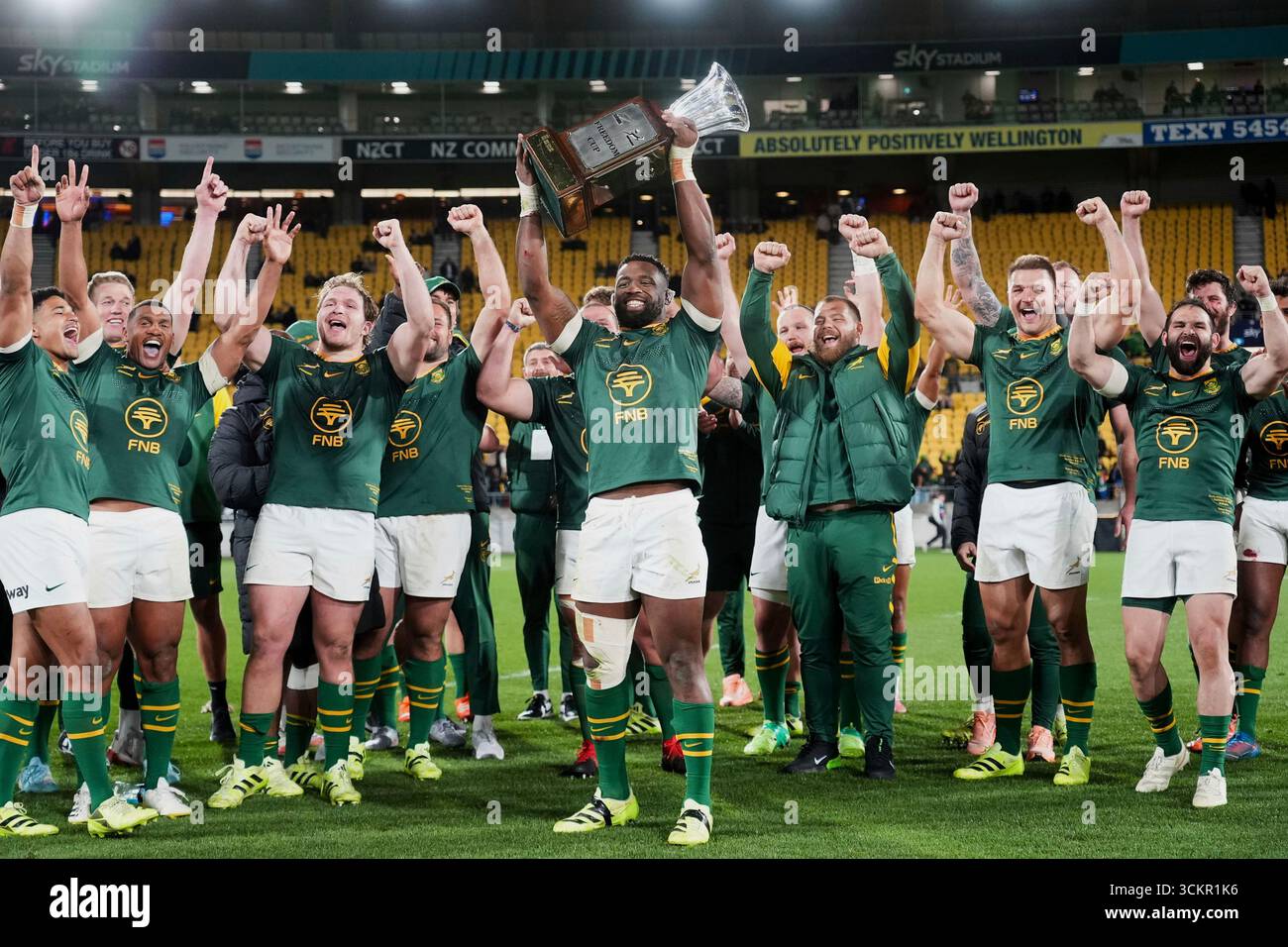 Springbok captain Siya Kolisi holds the Freedom Trophy aloft after ...