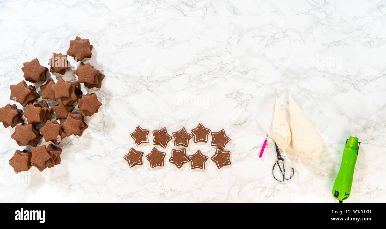 Perfectly Icing Star Cookies with Royal Icing Stock Photo - Alamy