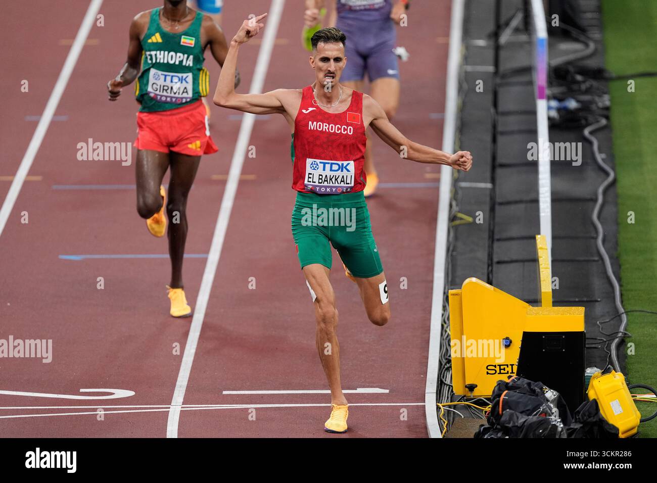 Morocco's Soufiane El Bakkali crosses the finish line in a men's 3,000 ...