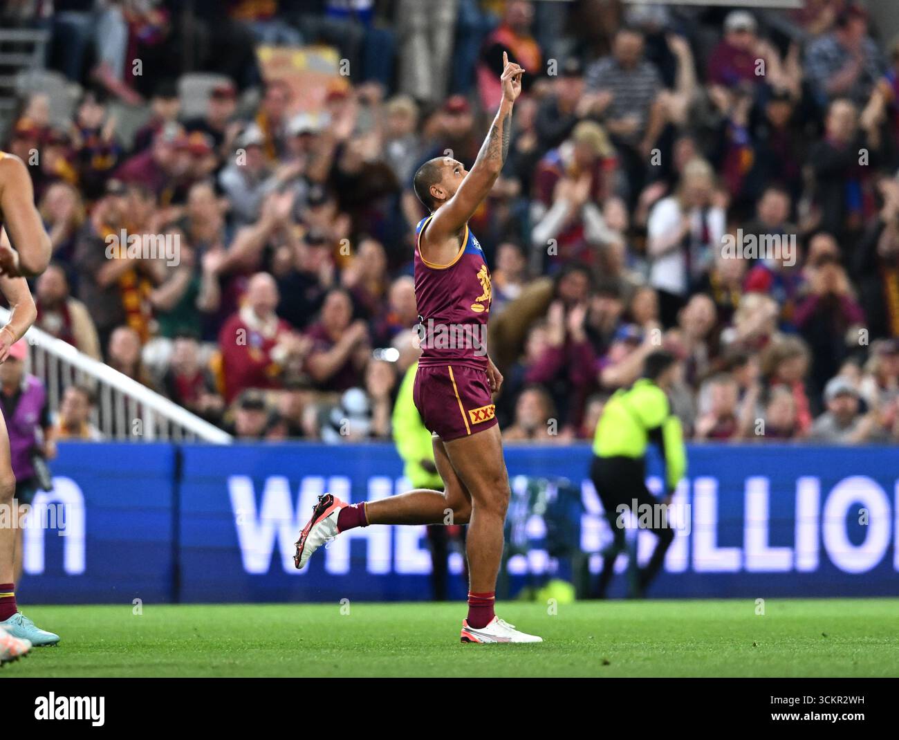 Callum Ah Chee of the Lions celebrates kicking a goal during the AFL ...