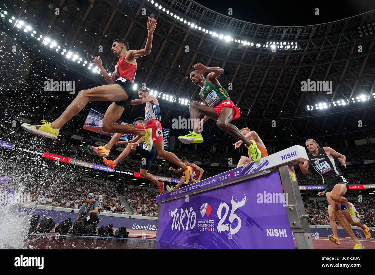 Ethiopia's Samuel Firewu, third form right, competes in a men's 3,000 ...