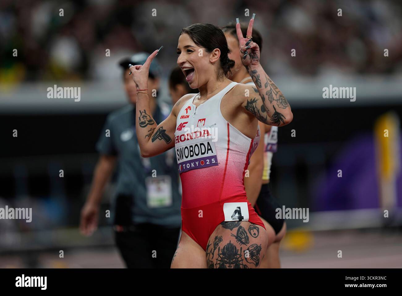 Poland's Ewa Swoboda competes in the women's 100 meters heat at the ...
