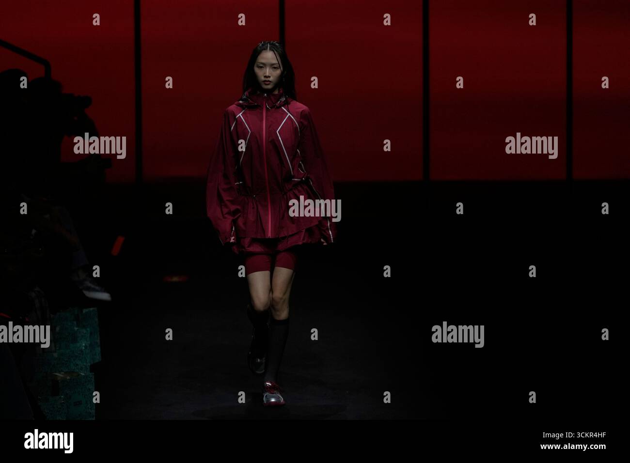 A model presents a creation from Lantu by Huazhou He during the SS2026 ...