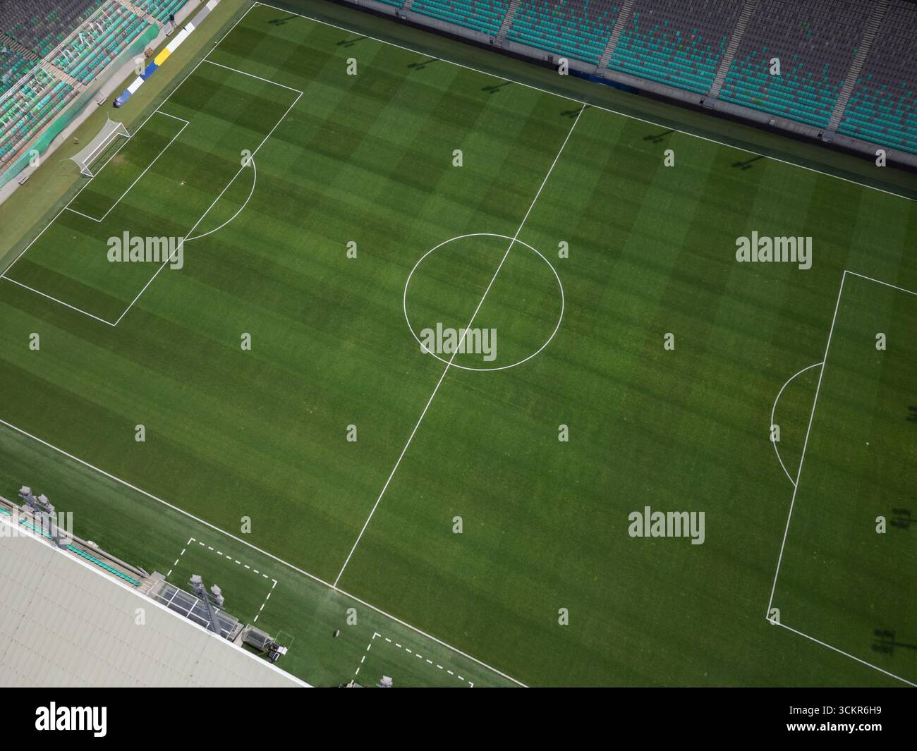 Aerial view of a large football soccer stadium field featuring neatly ...