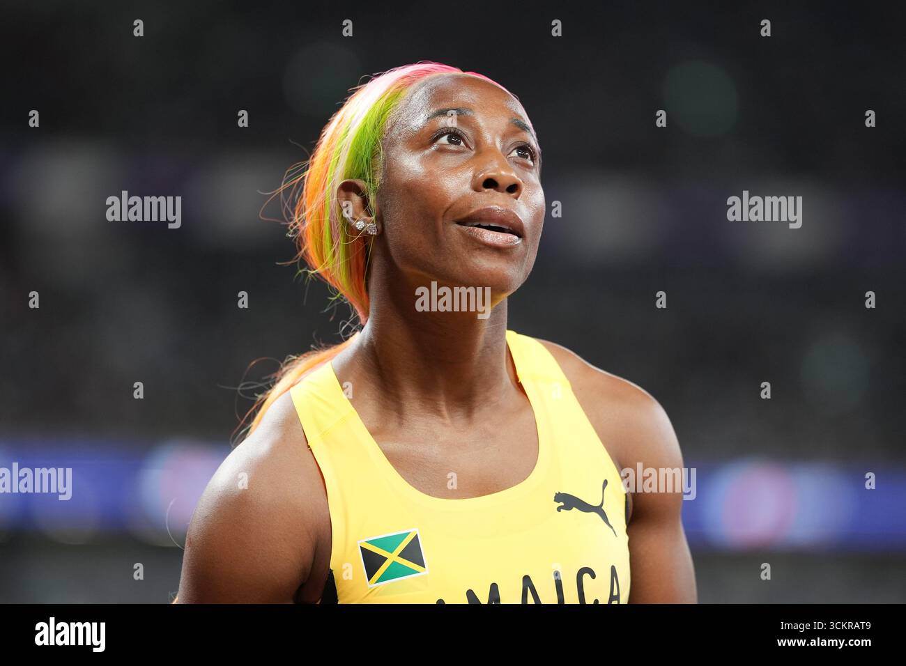 Shelly-Ann Fraser-Pryce of Jamaica reacts after finishing second in heat 7 in the Women's 100 ...