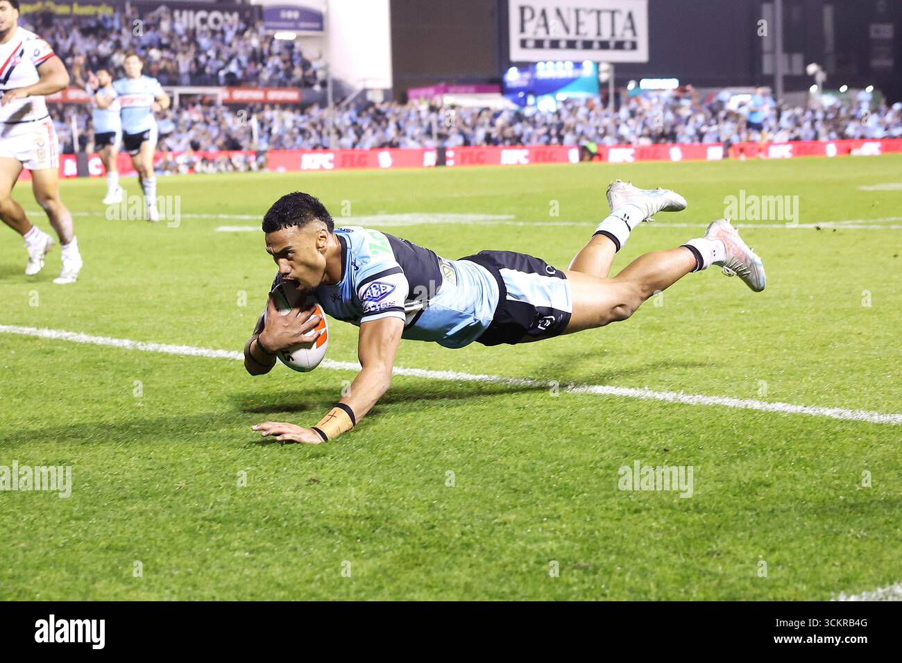 Ronaldo Mulitalo of the Sharks scores a try during the NRL Elimination ...