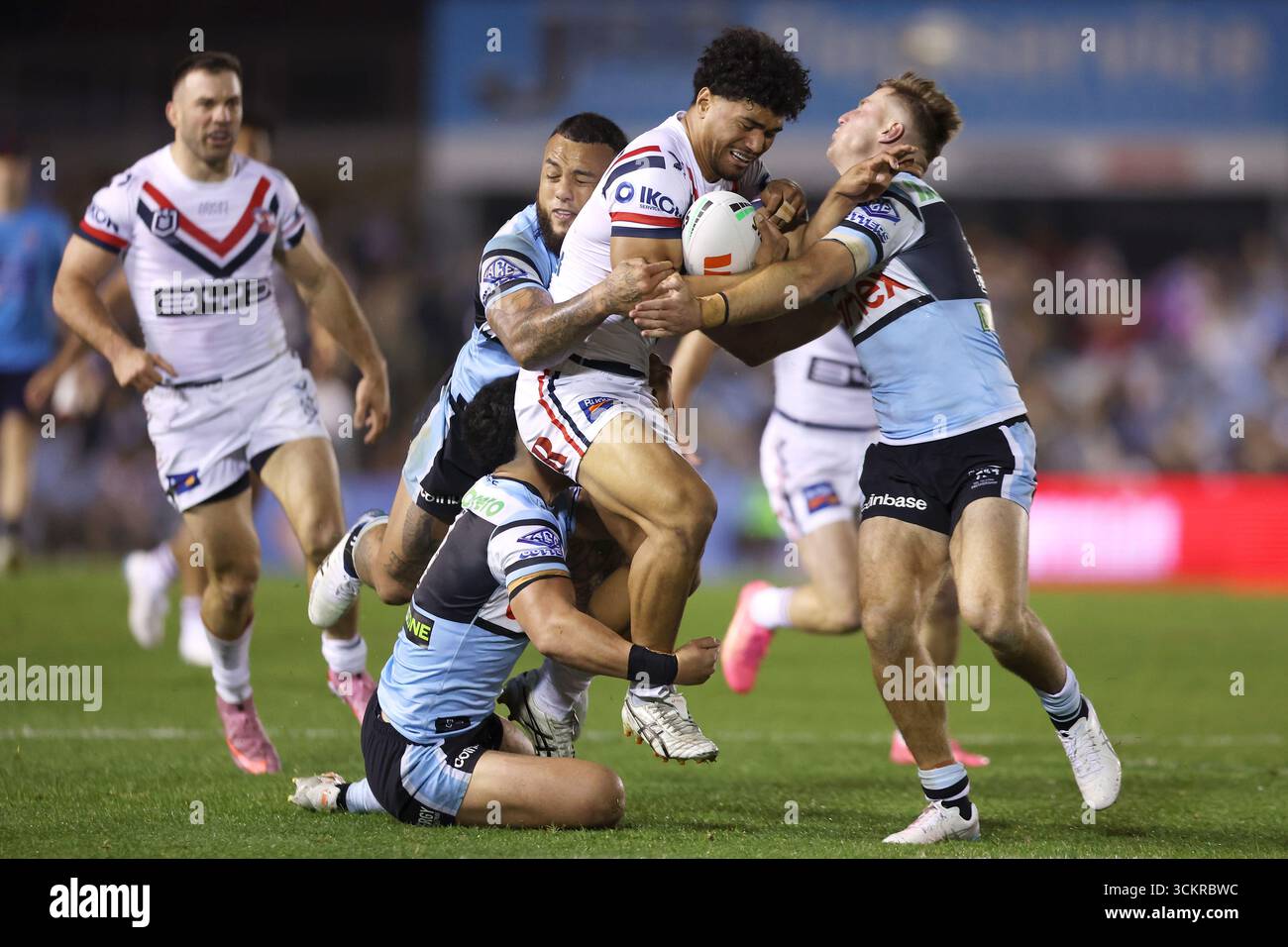 Robert Toia of the Roosters is tackled during the NRL Elimination Final ...