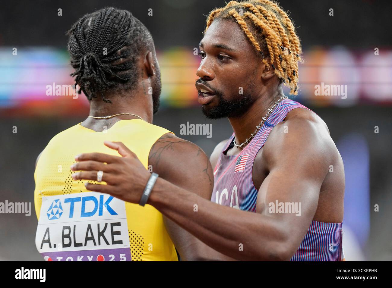 United States' Noah Lyles, right, congratulates Jamaica's Ackeem Blake ...