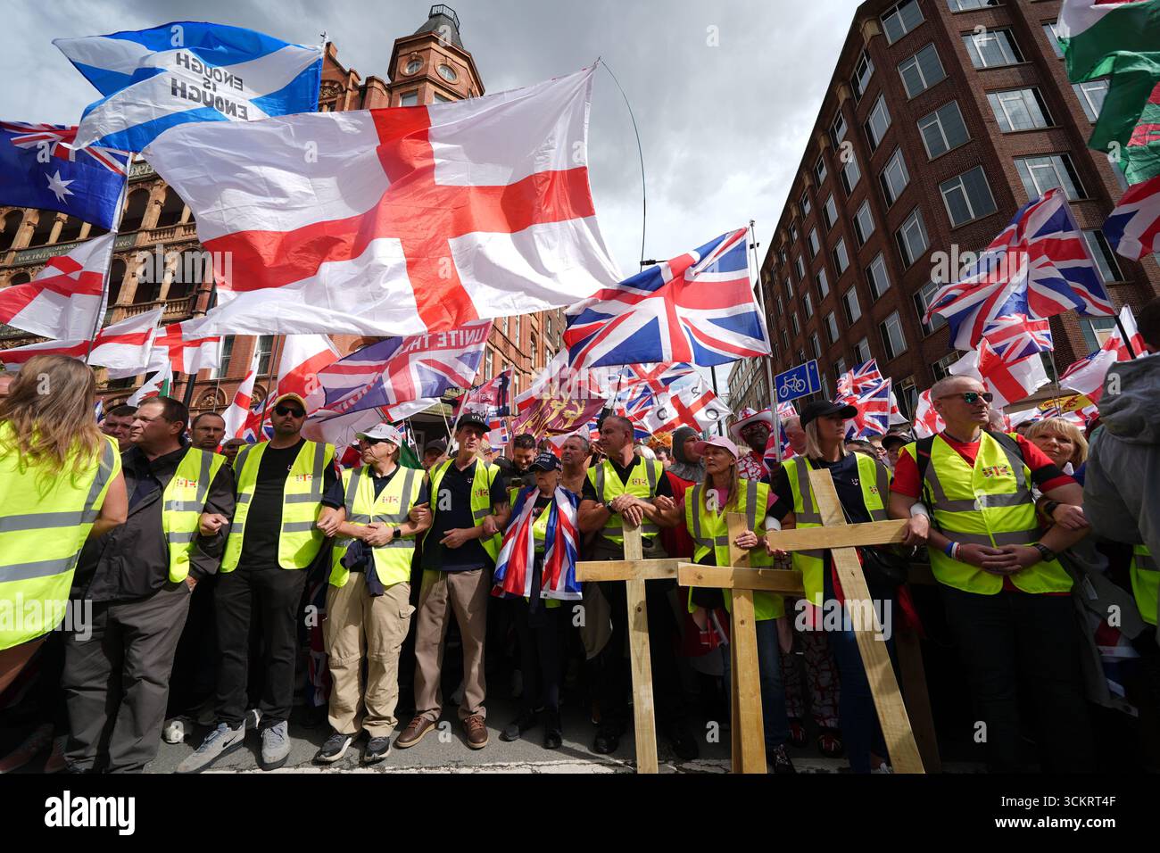 Activists fly Union flags, the Saltire and the St George Cross and ...