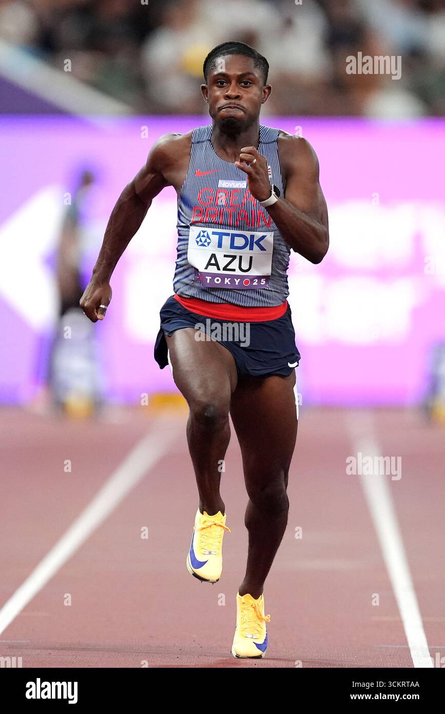 Jeremiah Azu of Great Britain (centre) competes in heat 4 of the Men's ...