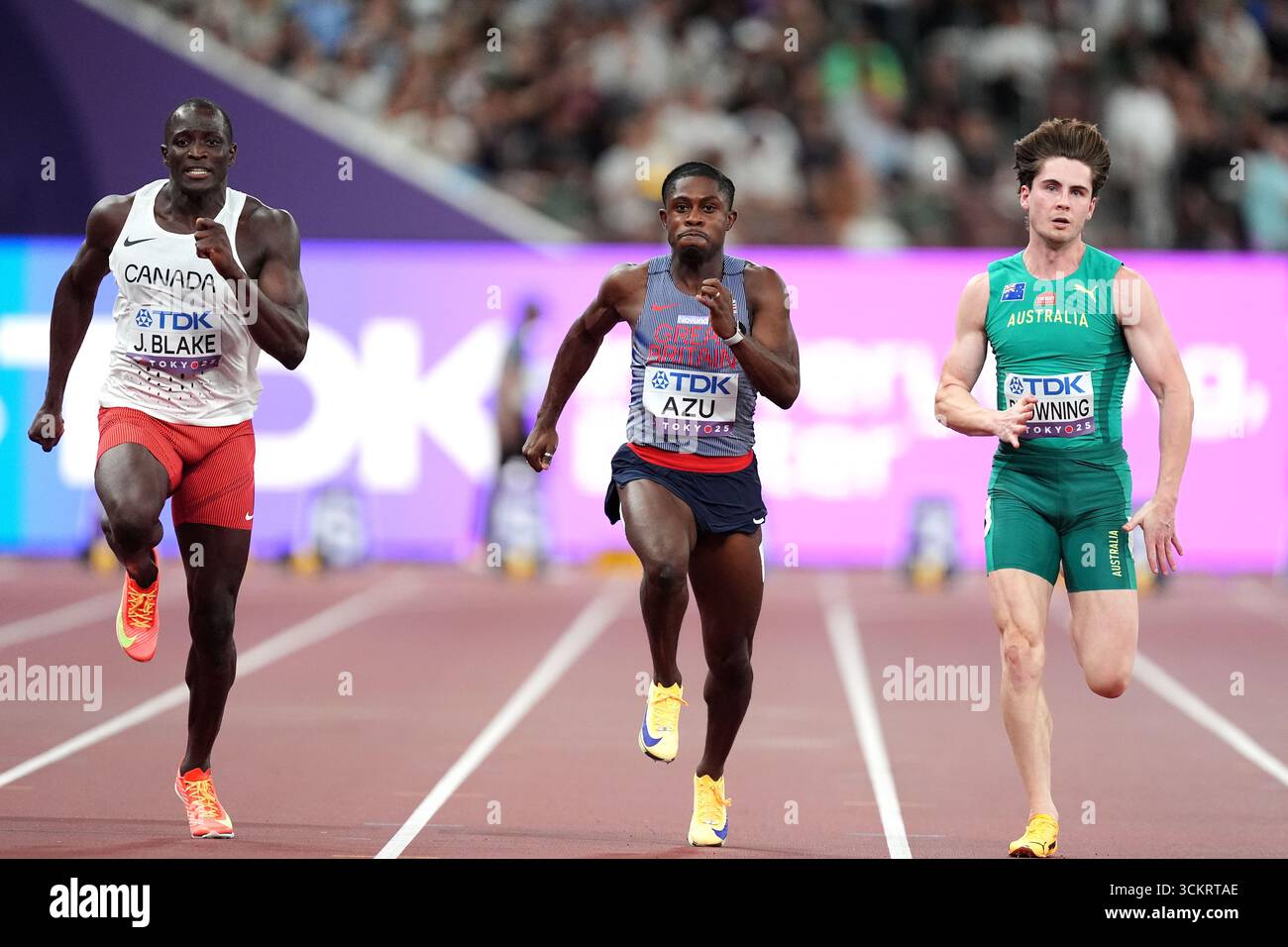 Jeremiah Azu of Great Britain (centre) competes in heat 4 of the Men's ...