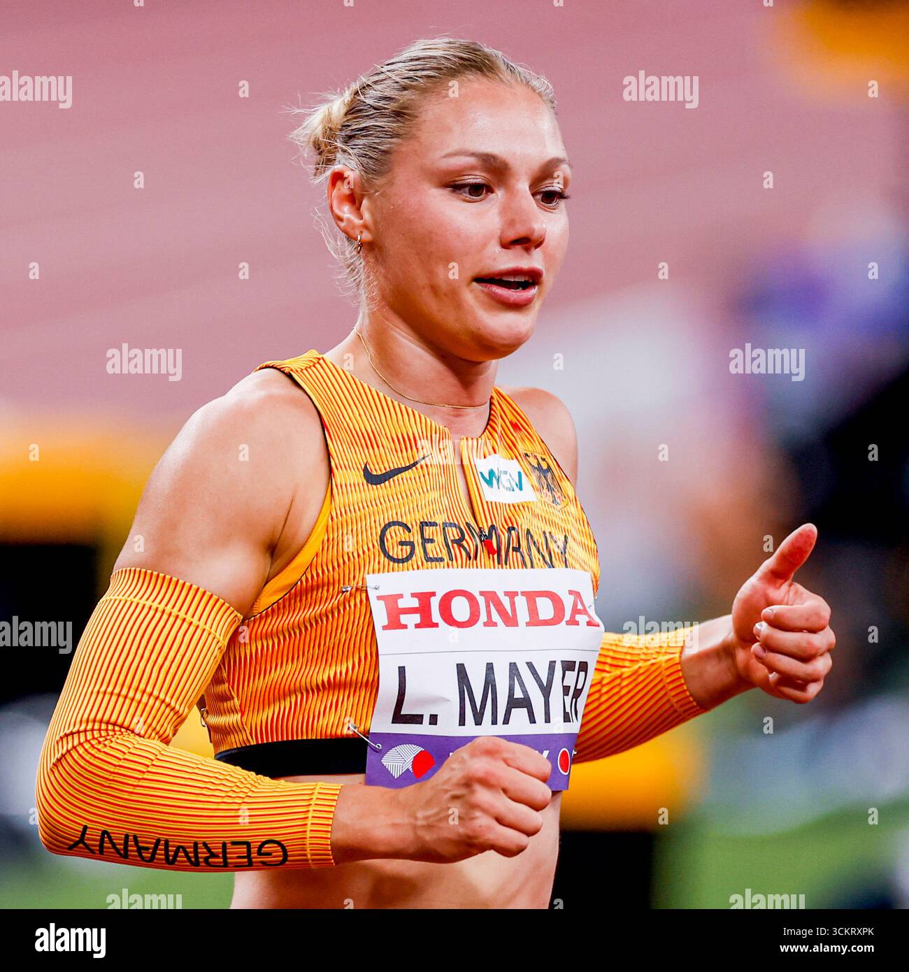 Lisa Mayer of Germany looks on after competing in the Women's 100 ...