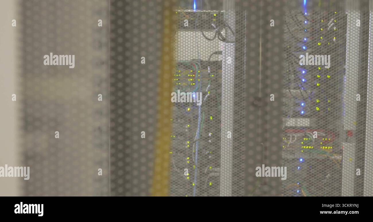 Showing rack behind perforated door in data center, featuring network ...