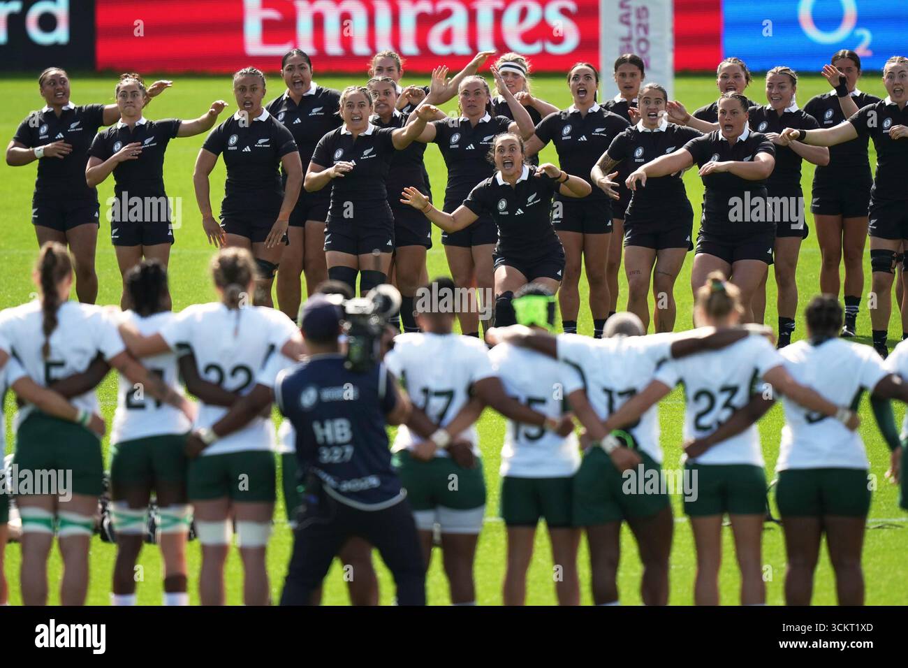 New Zealand's players, background, perform the Haka ahead of a Women's ...