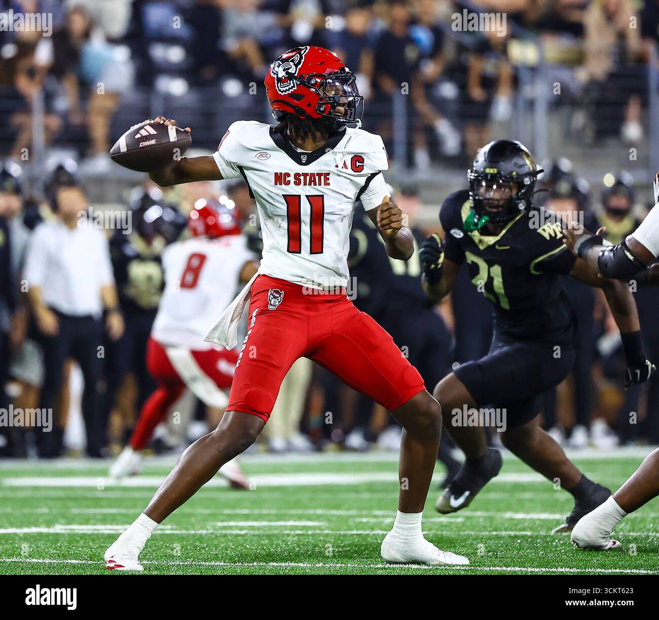 September 11,2025: NC State quarterback CJ Bailey (11) passes the ball ...