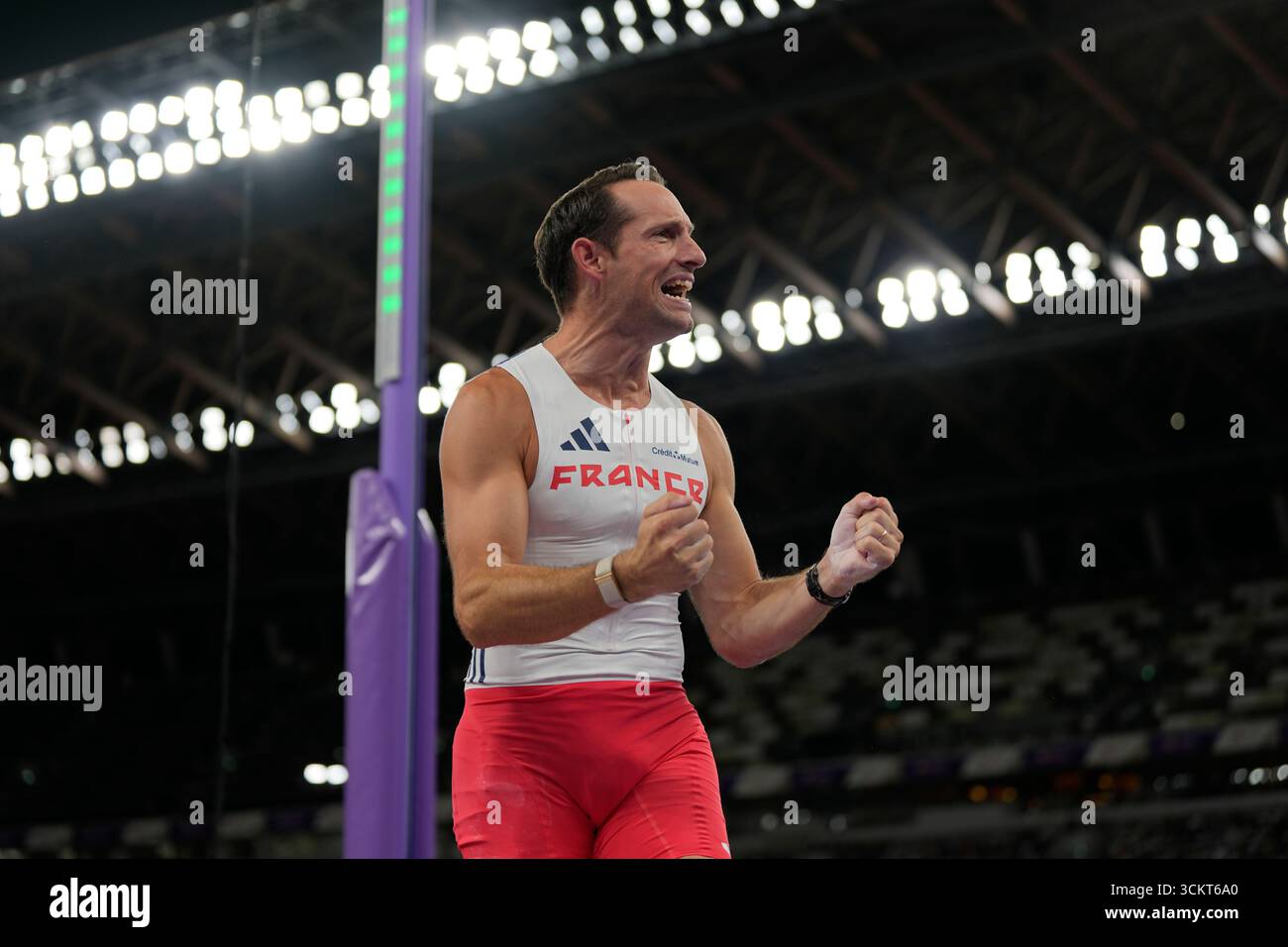 France's Renaud Lavillenie celebrates as he competes in the men's pole ...