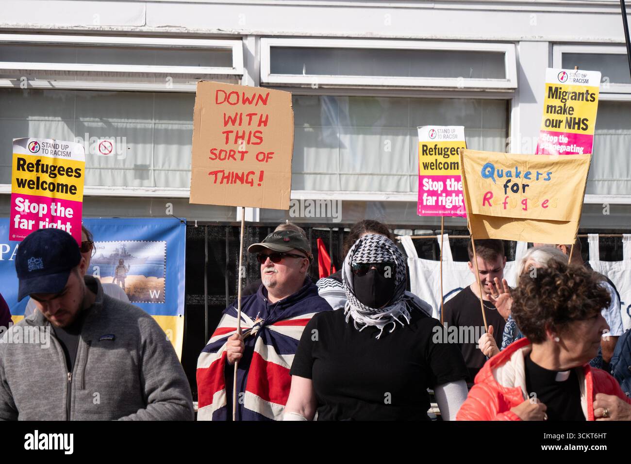 September 13, 2025, Falkirk, Scotland, UK: Pro-immigration groups Stand ...