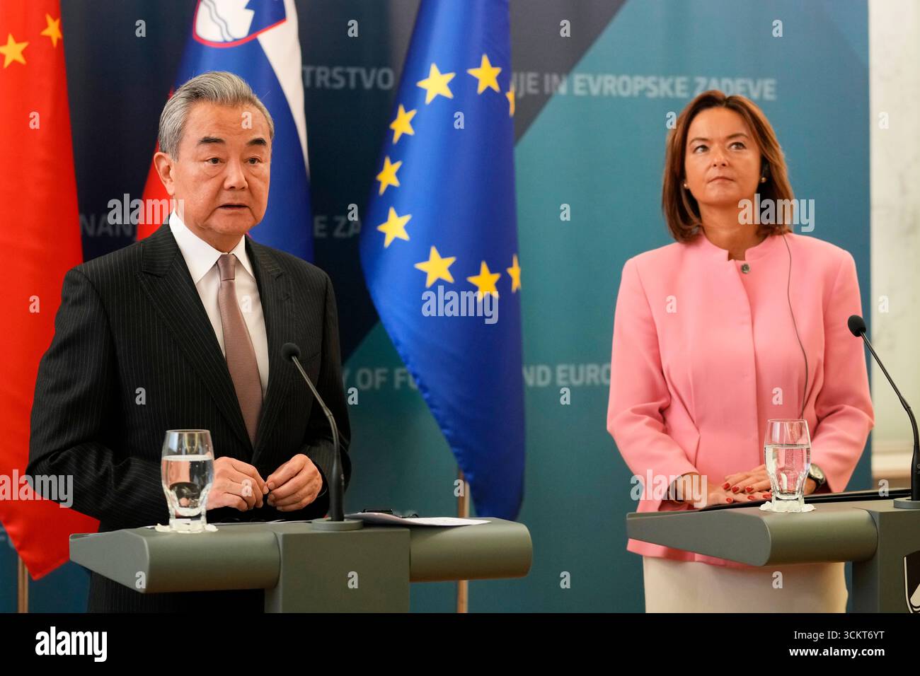 Chinese Foreign Minister Wang Yi, left, attends a news conference with ...