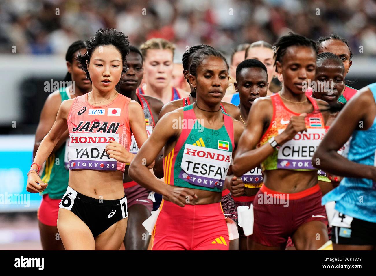 Japan's Mikuni Yada, second left, competes in the women's 10,000 meters ...