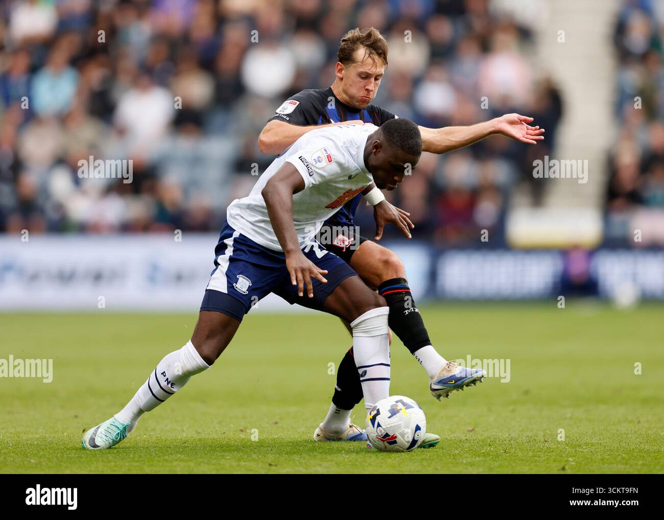Preston North End's Thierry Small (left) and Middlesbrough's Callum ...