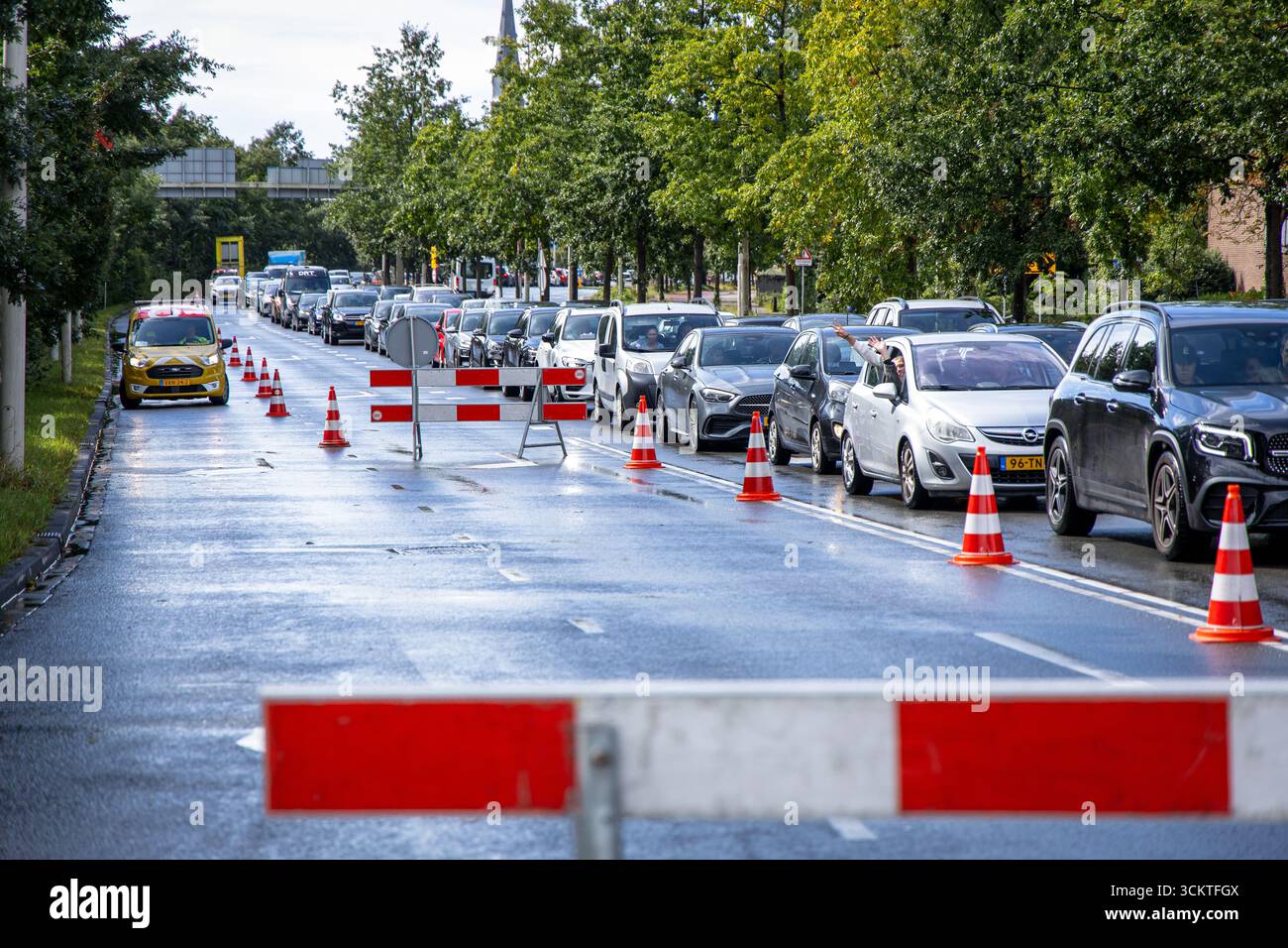 THE HAGUE – A line of cars on Zuid-Hollandlaan in The Hague. The exit ...