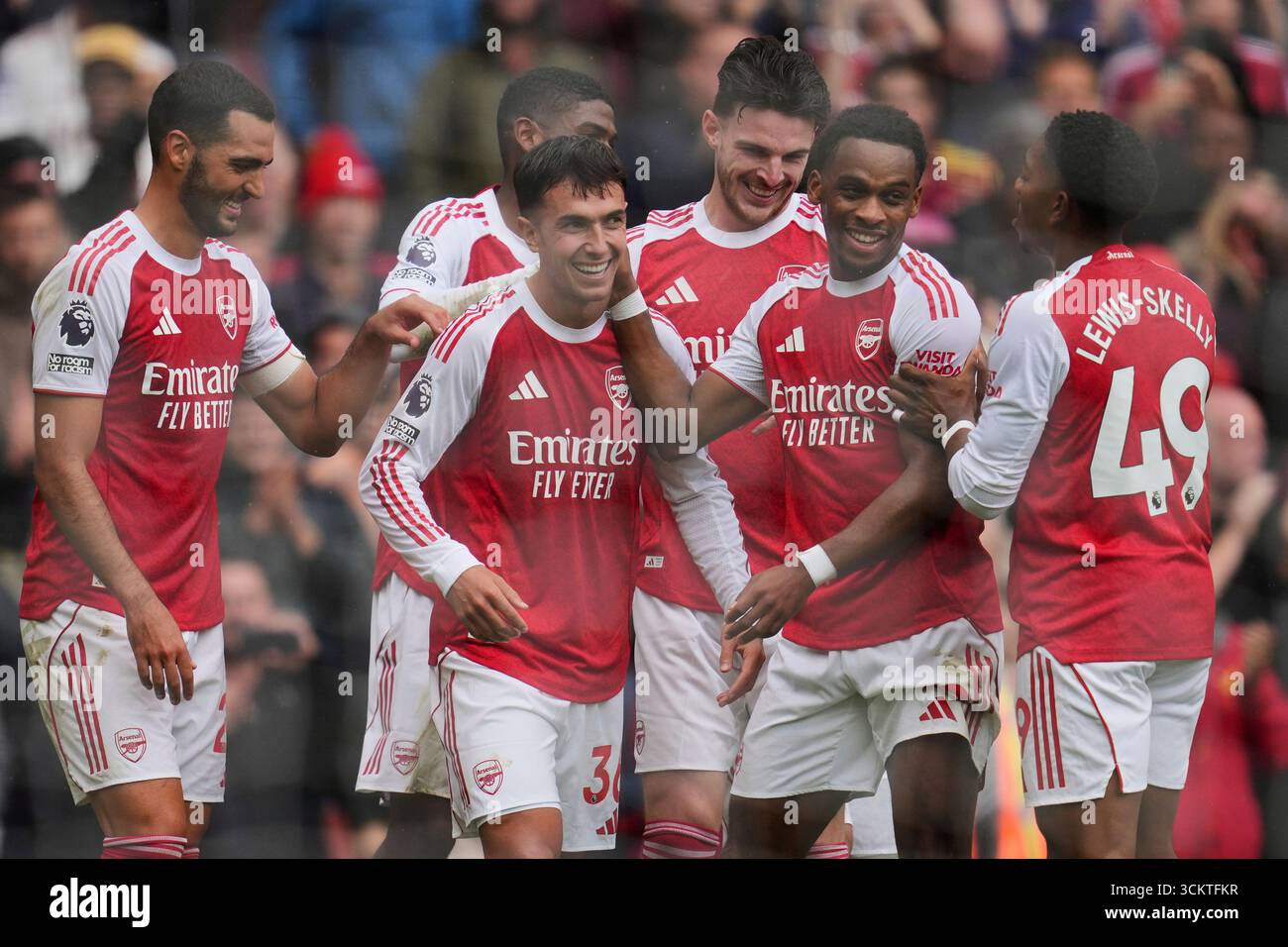Arsenal players celebrate after a goal during the Premier League soccer ...