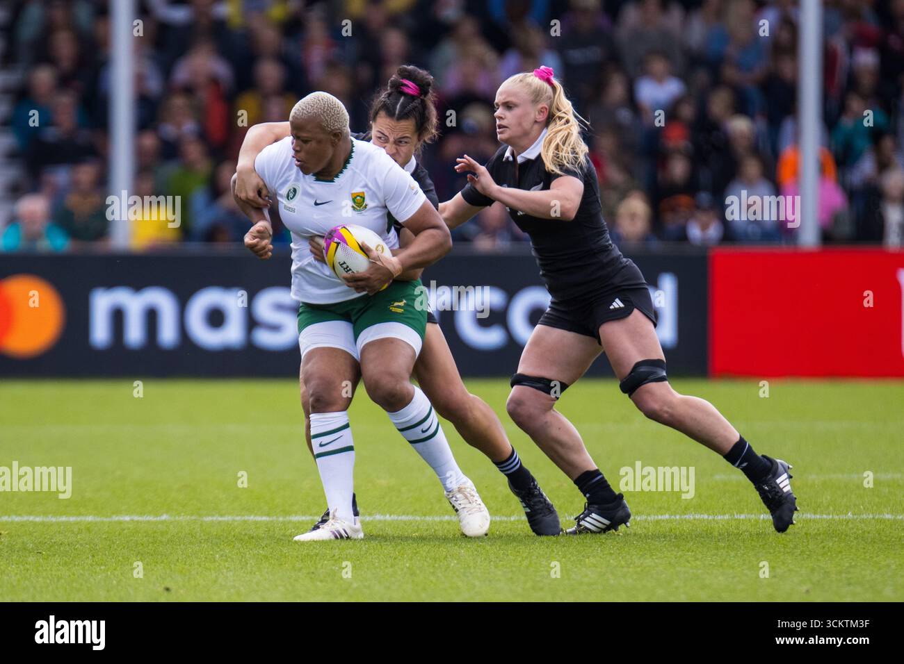 Aseza Hele (Back row – South Africa and Boland Dames) is tackled by ...