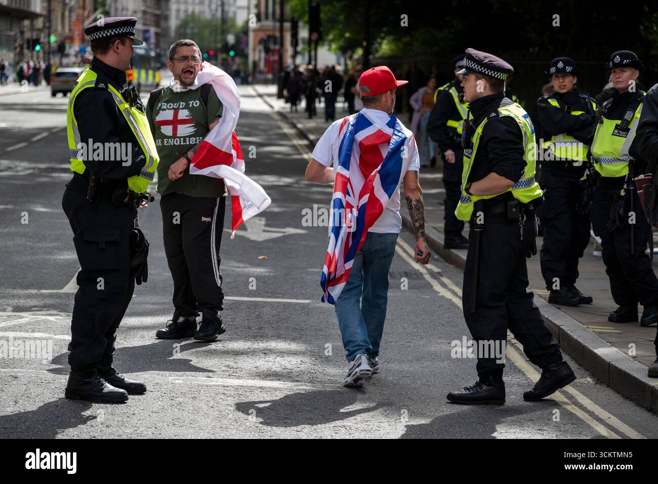 London, UK. 13 September 2025. A man wearing a Union Jack flags is ...