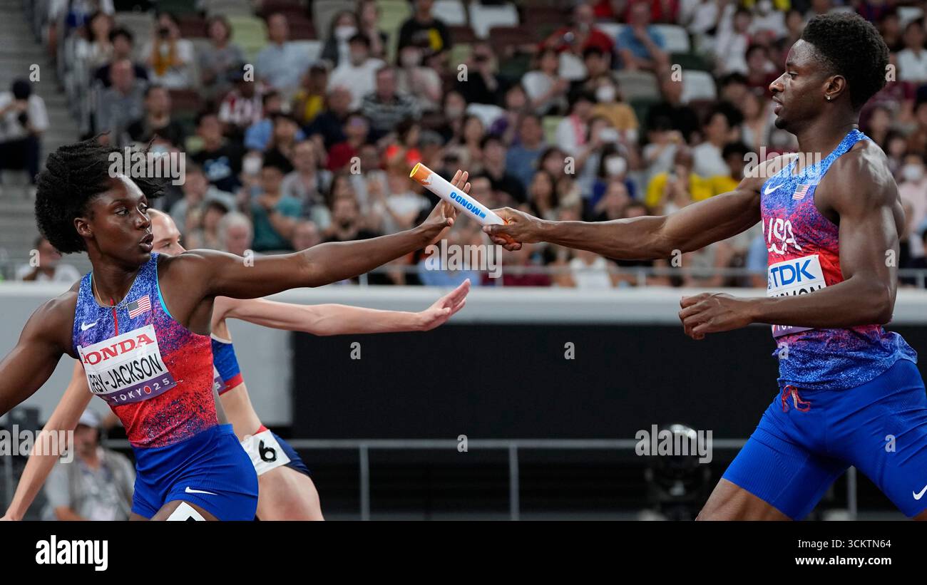 United States' Bryce Deadmon, right, hands off to Lynna Irby-Jackson ...