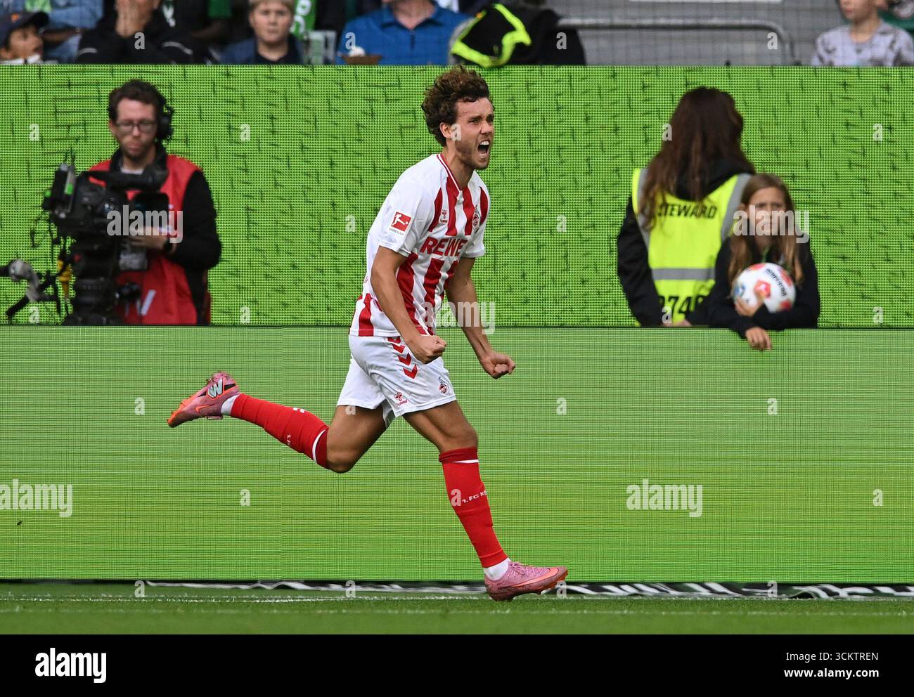 Cologne' Luca Waldschmidt celebrates after scoring the opening goal ...