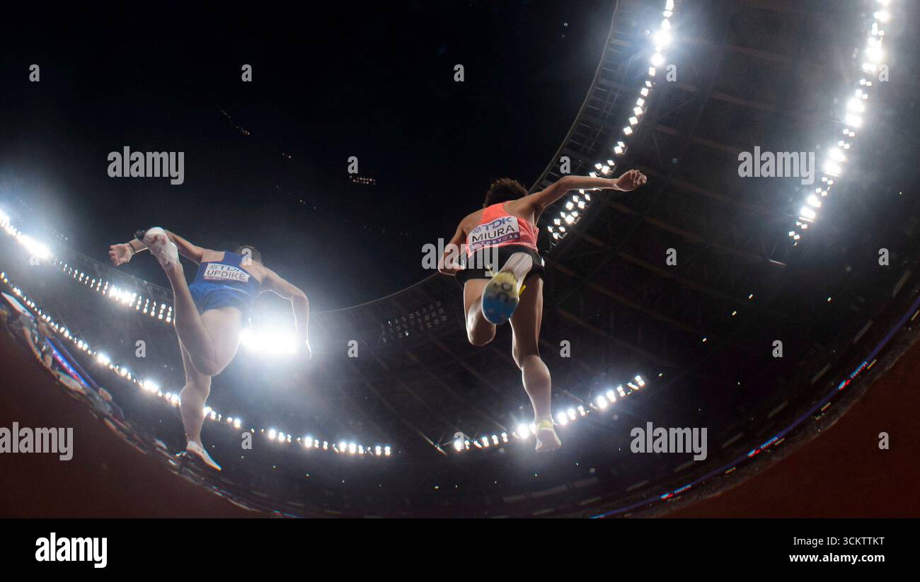 Isaac Updike of US, left, and Ryuji Miura of Japan compete in men's ...