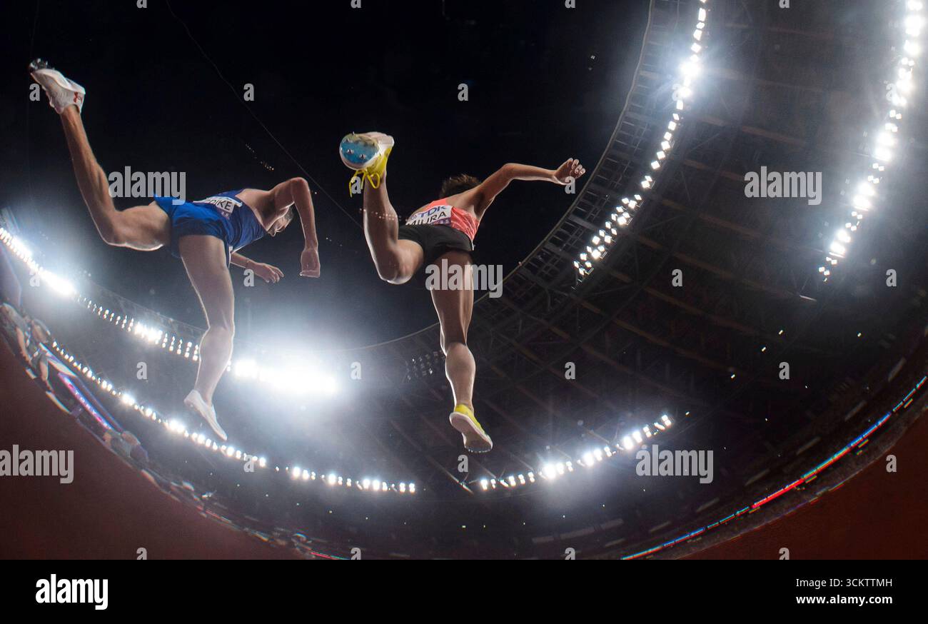 Isaac Updike of US, left, and Ryuji Miura of Japan compete in men's ...