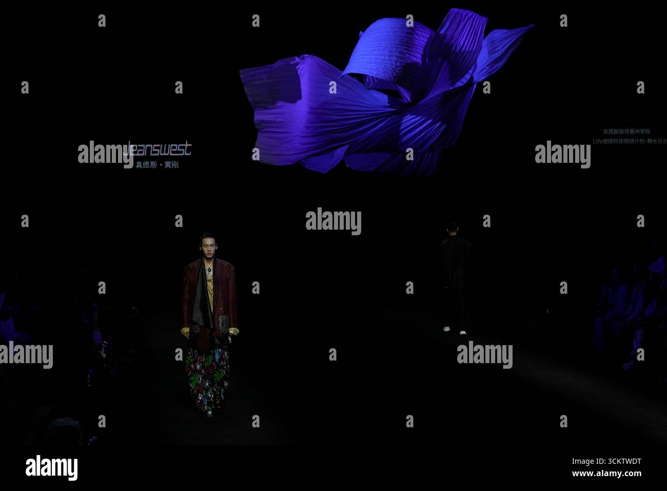 A model showcases a creation from the Jeanswest collection by Gang ...