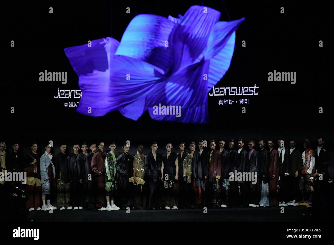 Models showcase a creation from the Jeanswest collection by Gang Huang ...