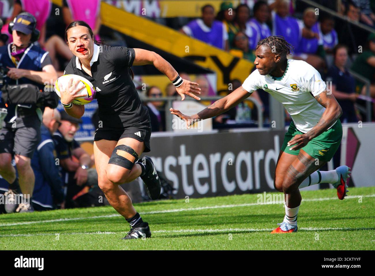New Zealand's Stacey Waaka (left) with the ball as her nose appears to ...