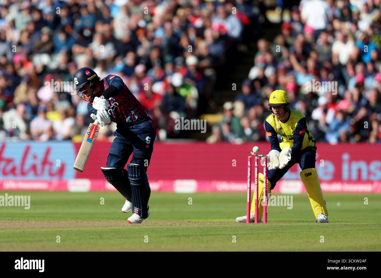 Northamptonshire's Tim Robinson is bowled by Hampshire's Bjorn Fortuin ...