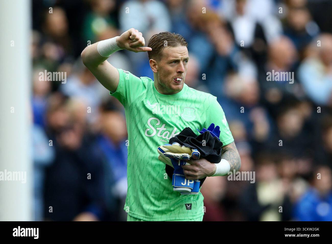 Jordan Pickford, the Everton goalkeeper makes his way to his goal prior ...