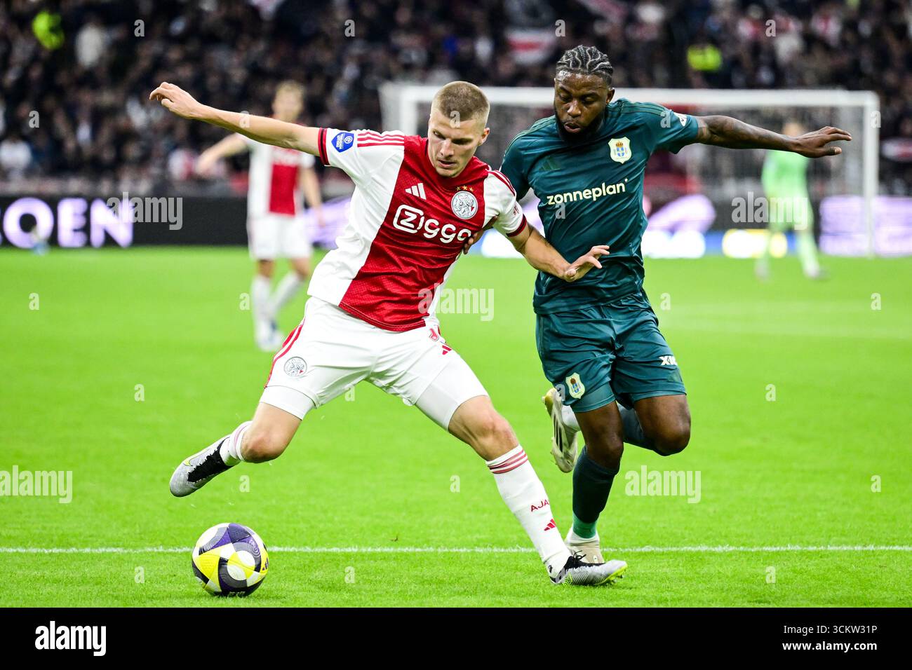 AMSTERDAM – (l-r) Anton Gaaei of Ajax, Sherel Floranus of PEC Zwolle during the Dutch Eredivisie ...