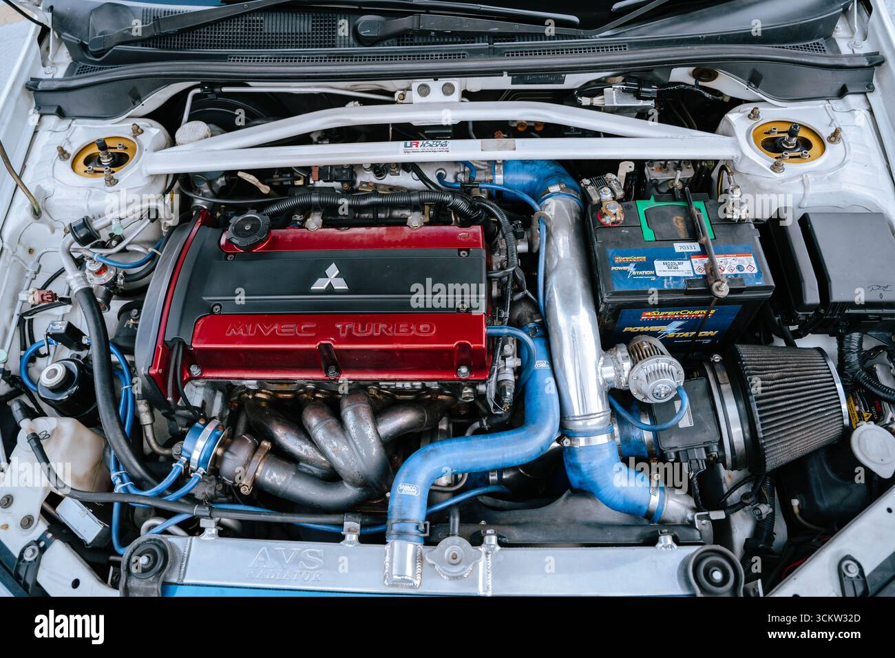 Red Mitsubishi Evo 9 Stock Photo - Alamy
