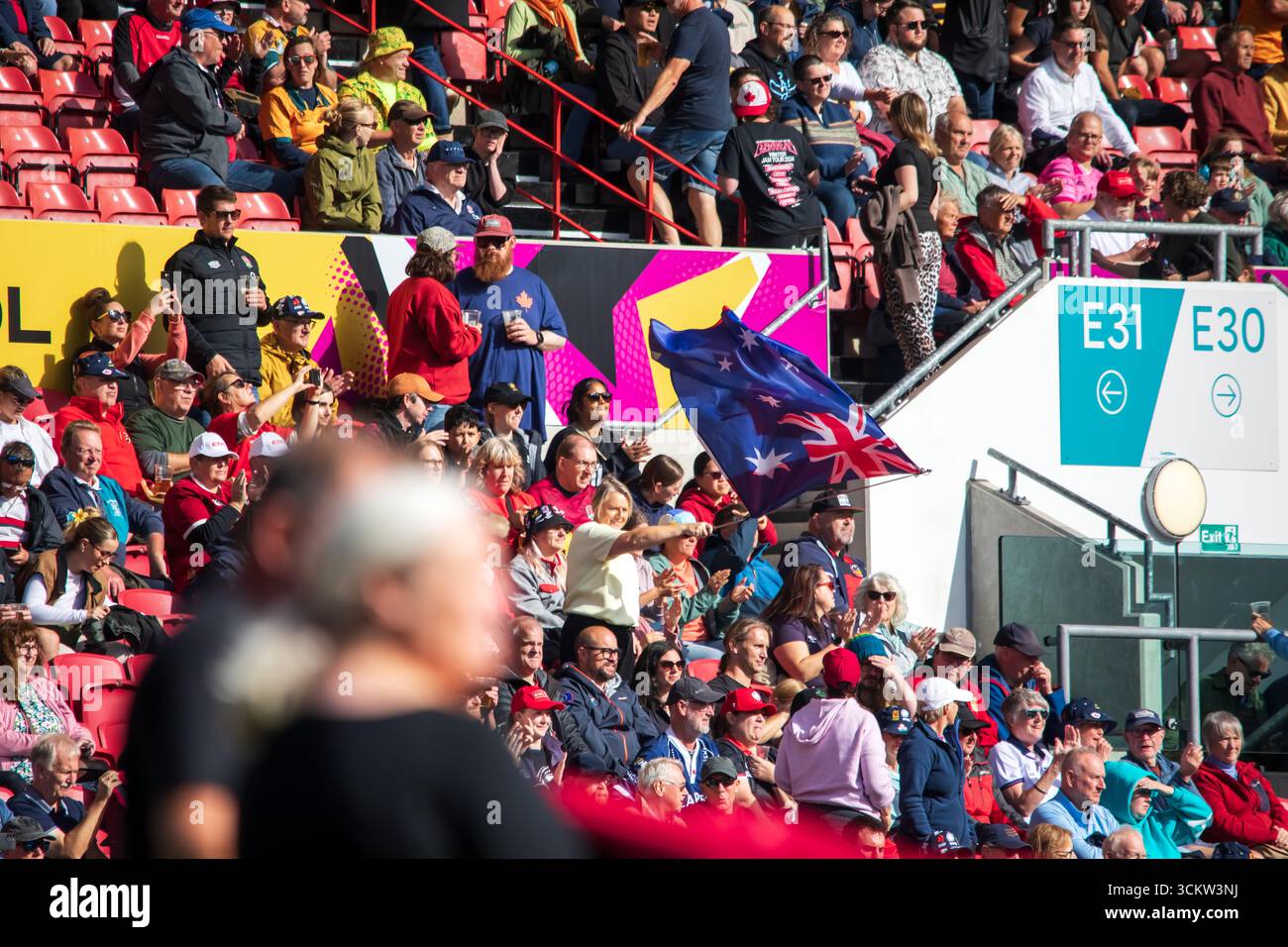 Bristol, UK, 13th September 2025 A rugby support waves a flag, showing ...