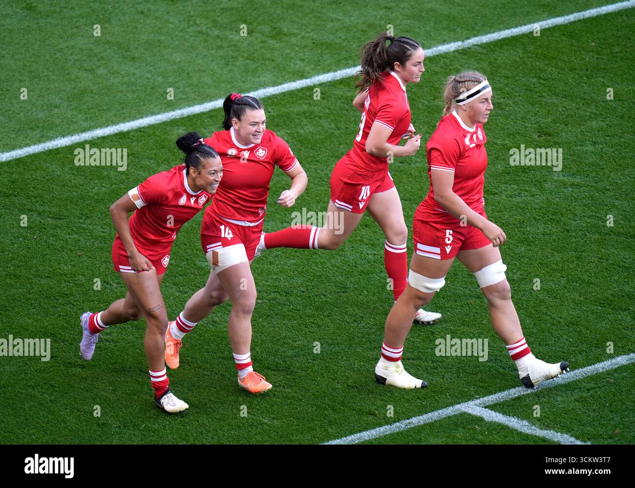 Canada's Asia Hogan-Rochester (left) celebrates scoring their side's ...